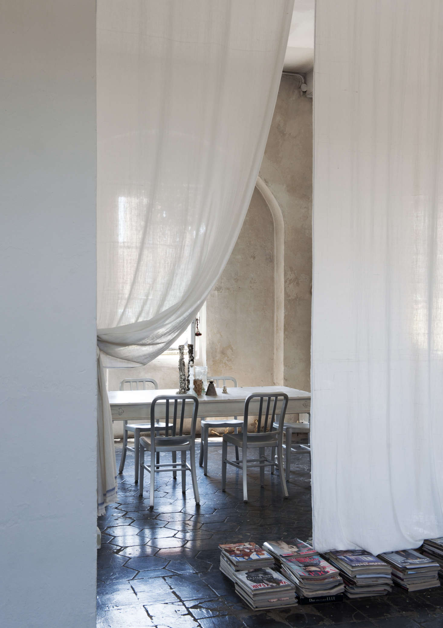 A Romantic/Industrial Milan Loft for a Bohemian Design Duo - Remodelista