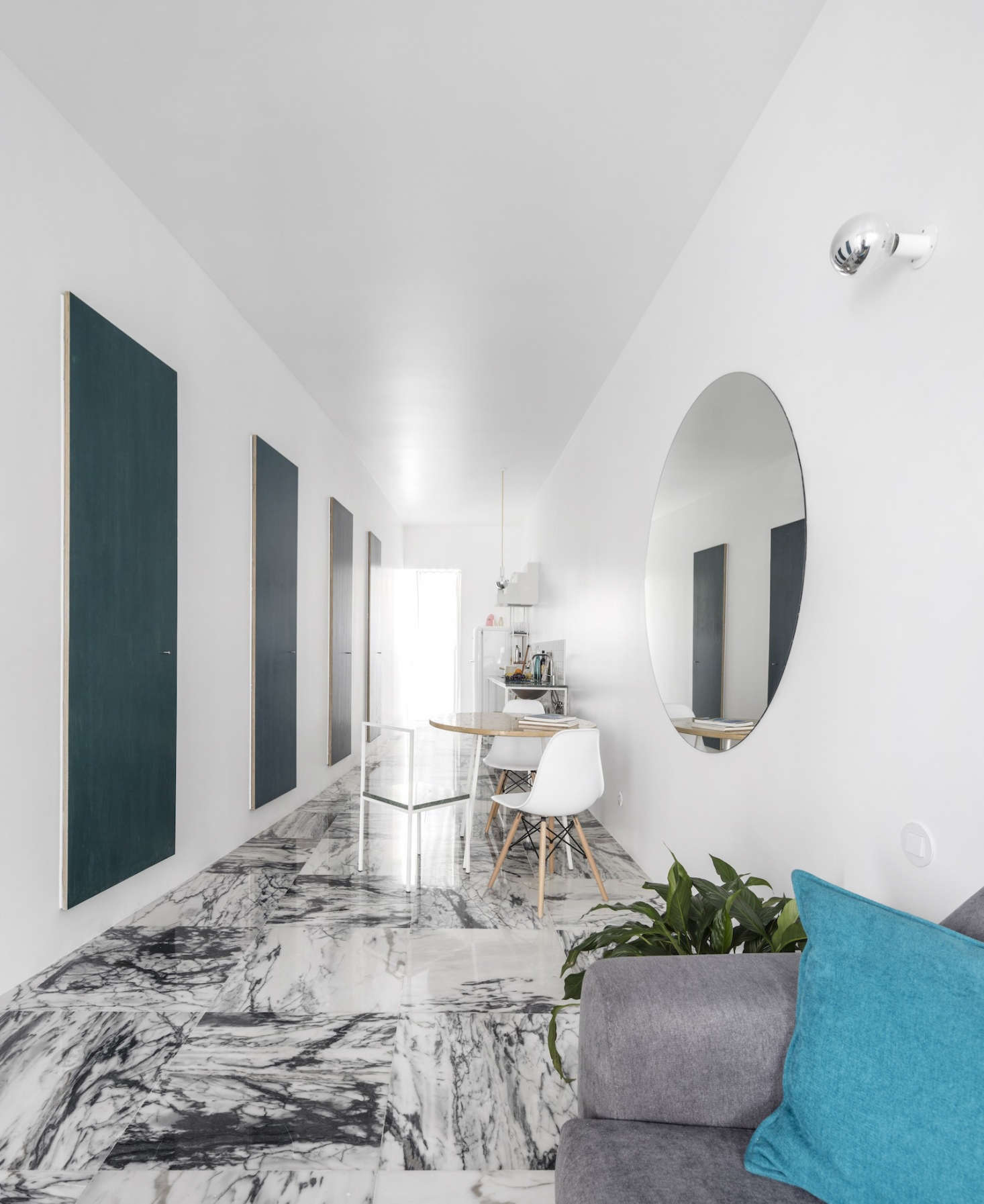 In Lisbon, a Narrow but Glamorous Marble-Clad Apartment - Remodelista