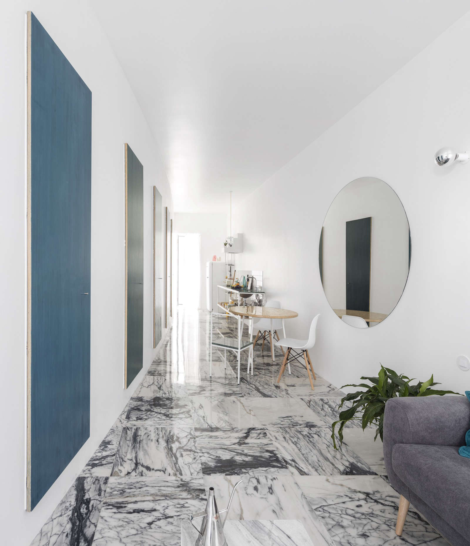 In Lisbon, a Narrow but Glamorous Marble-Clad Apartment - Remodelista