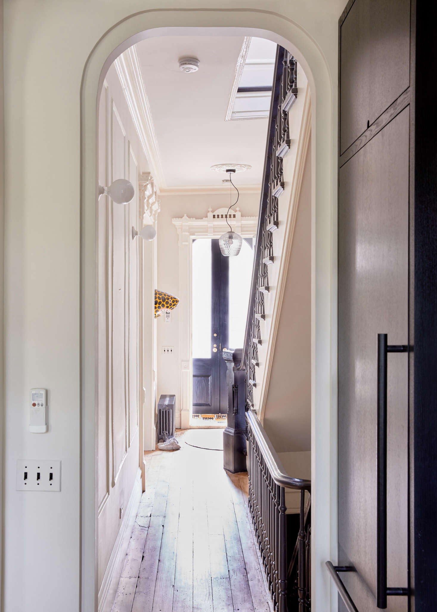 Warm minimalism in a young architect's own Brooklyn townhouse renovation