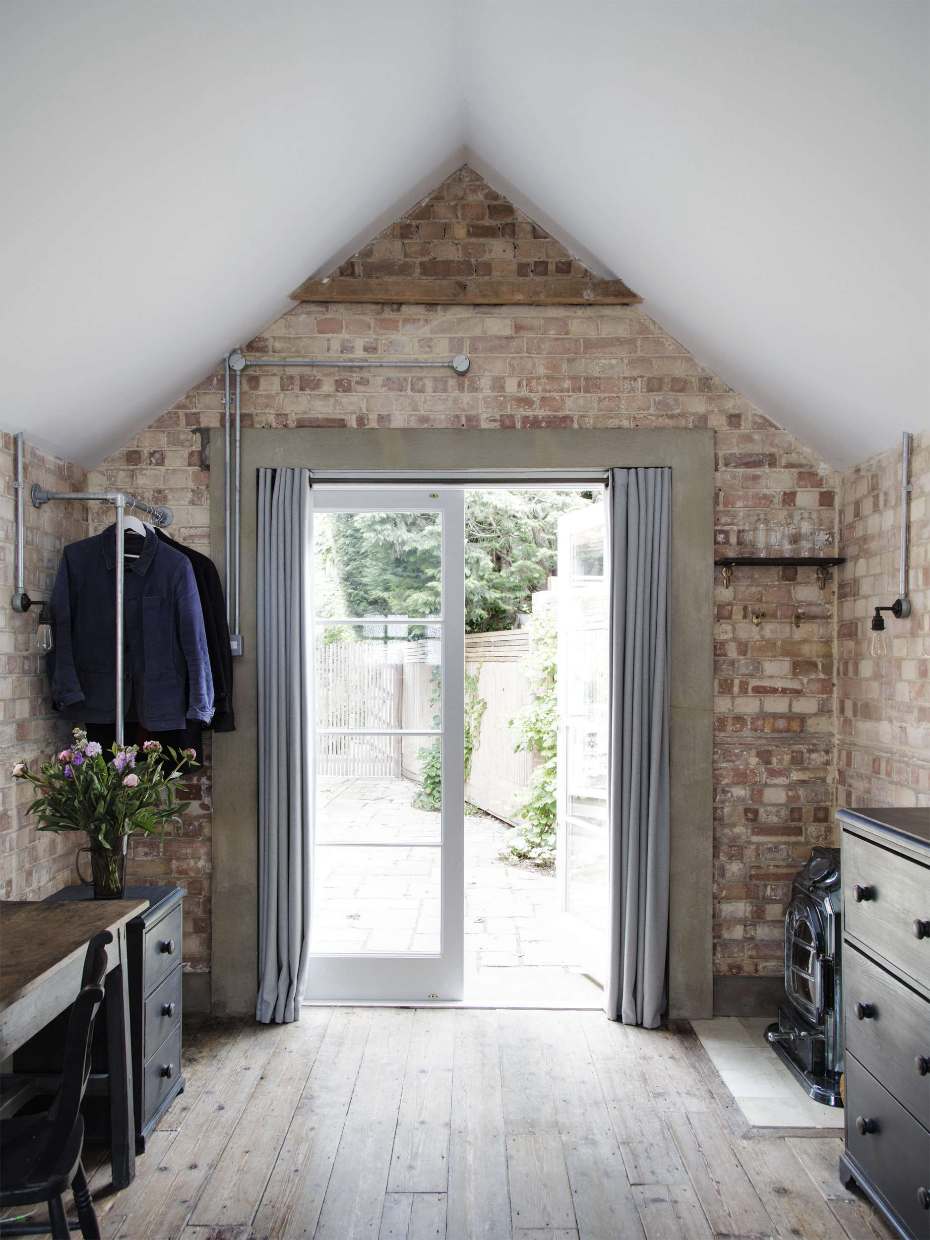 Garage conversion to a stylish guest room Mark Lewis interior design London