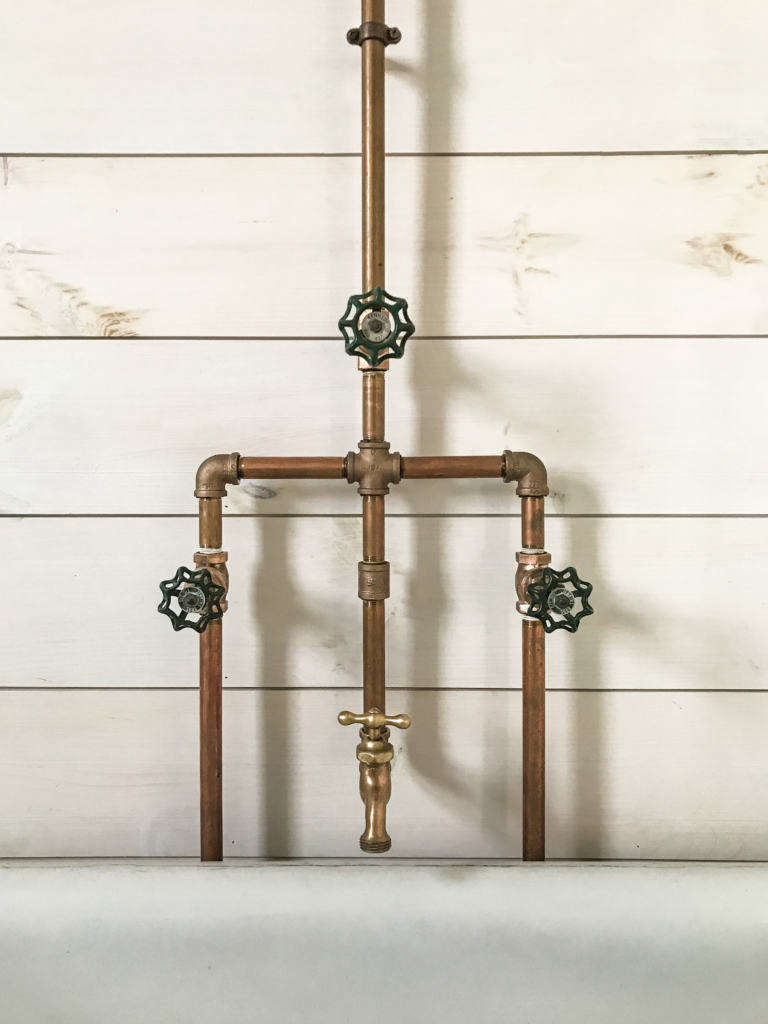 A DIY Shower Curtain Hoop Made from Brass Pipes, by Zio & Sons