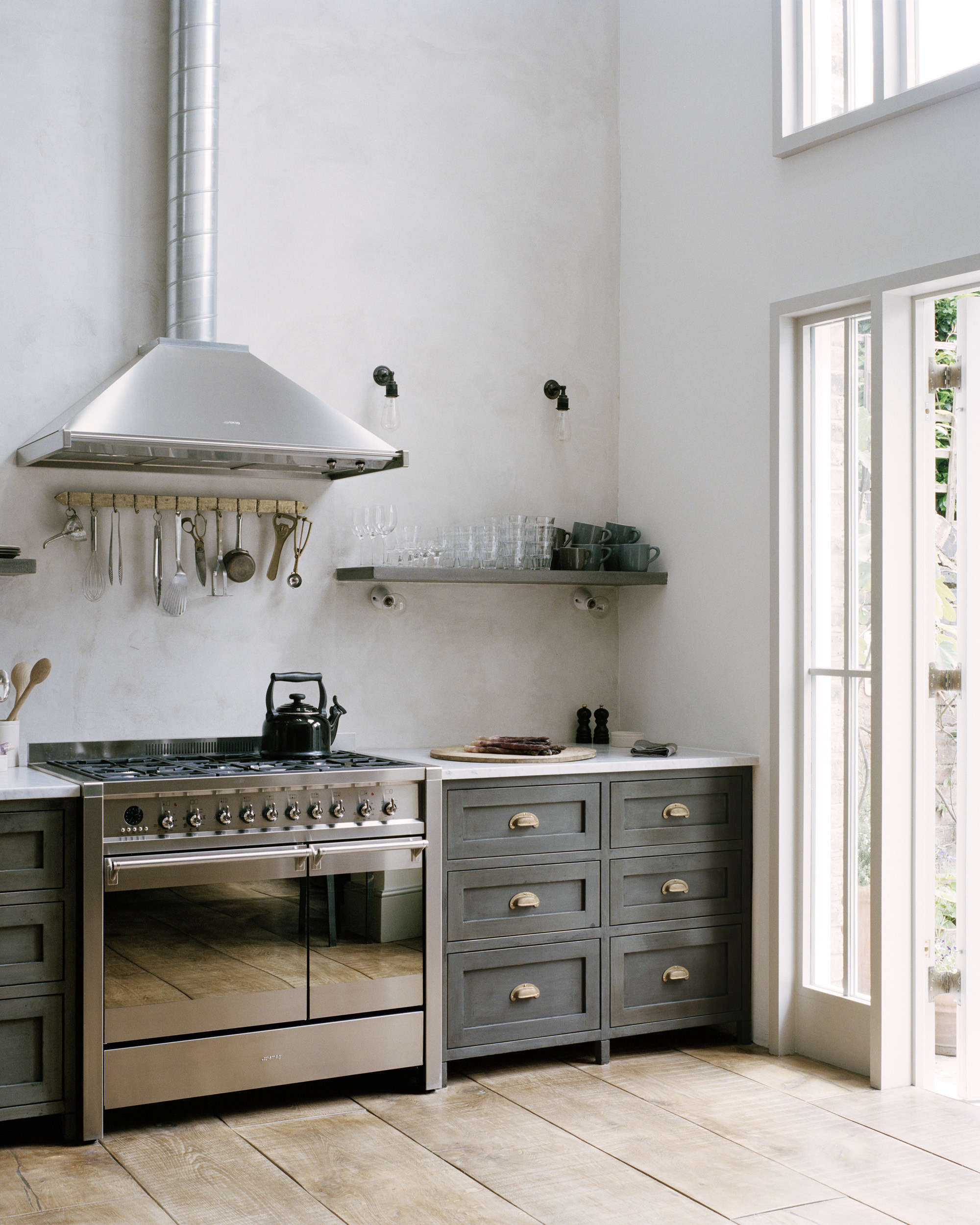 Victorian row house updated as lofty duplex by interior design Mark Lewis