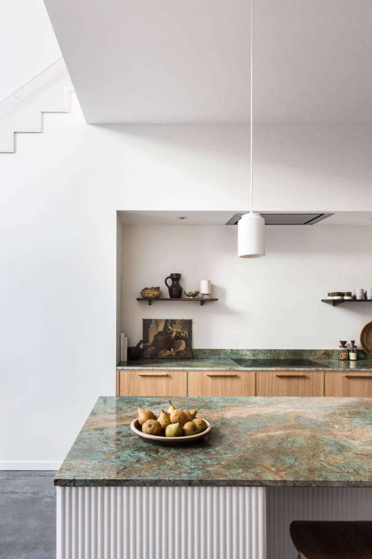 Fluted Architectural Detailing on Kitchen Islands and Wall Paneling