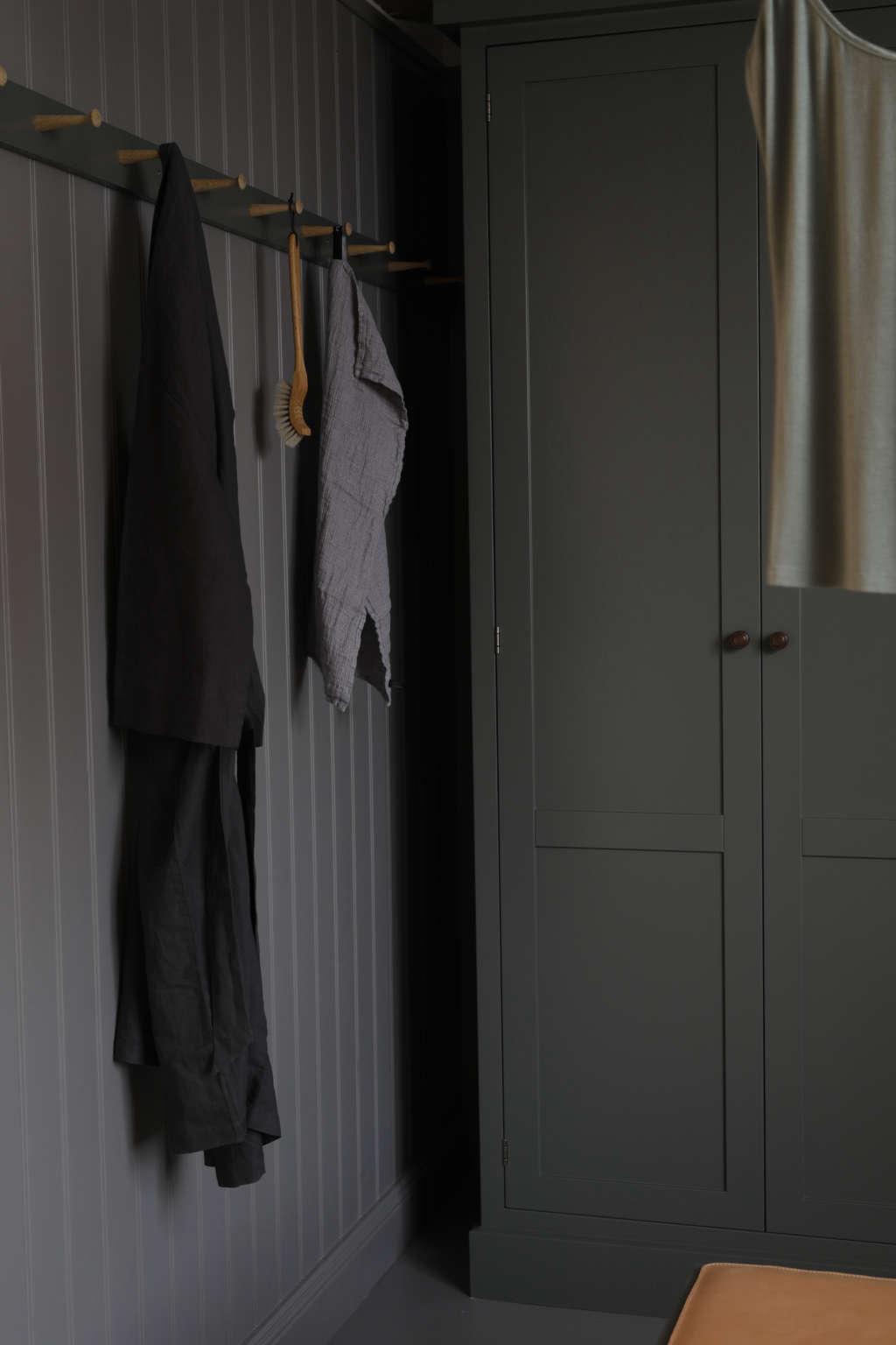 Dream Dressing Room: Built-In Storage, Wood Paneling, and a Double Sink