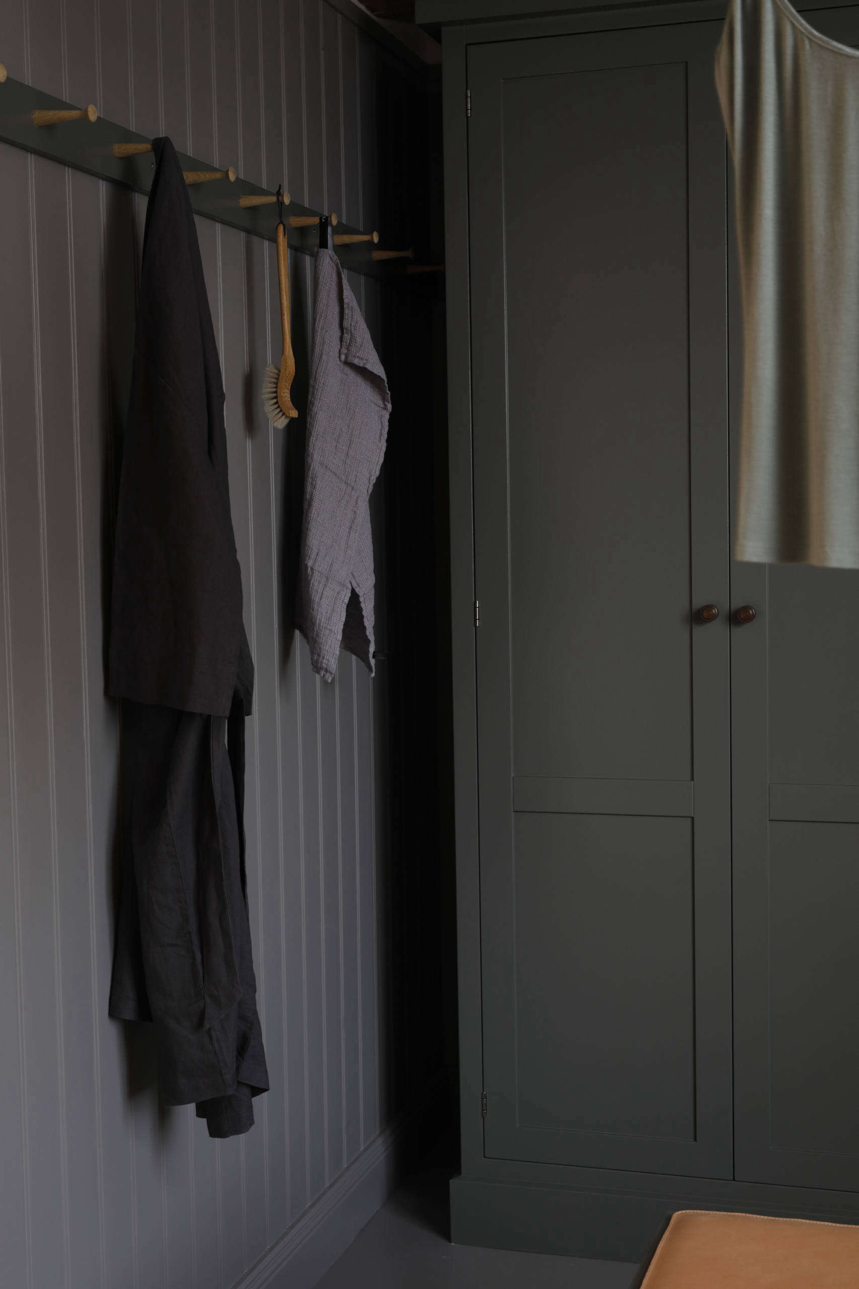Dream Dressing Room: Built-In Storage, Wood Paneling, and a Double Sink