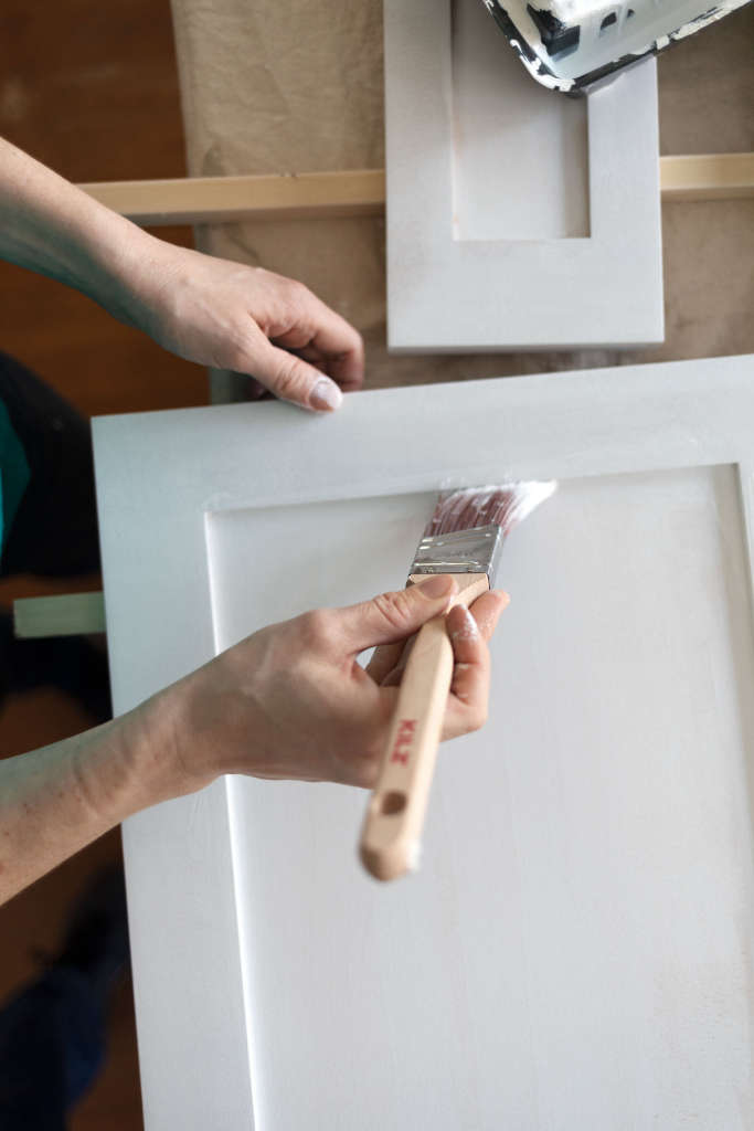 How to Paint Kitchen Cabinets By Hand: DIY Tips from Two Experts