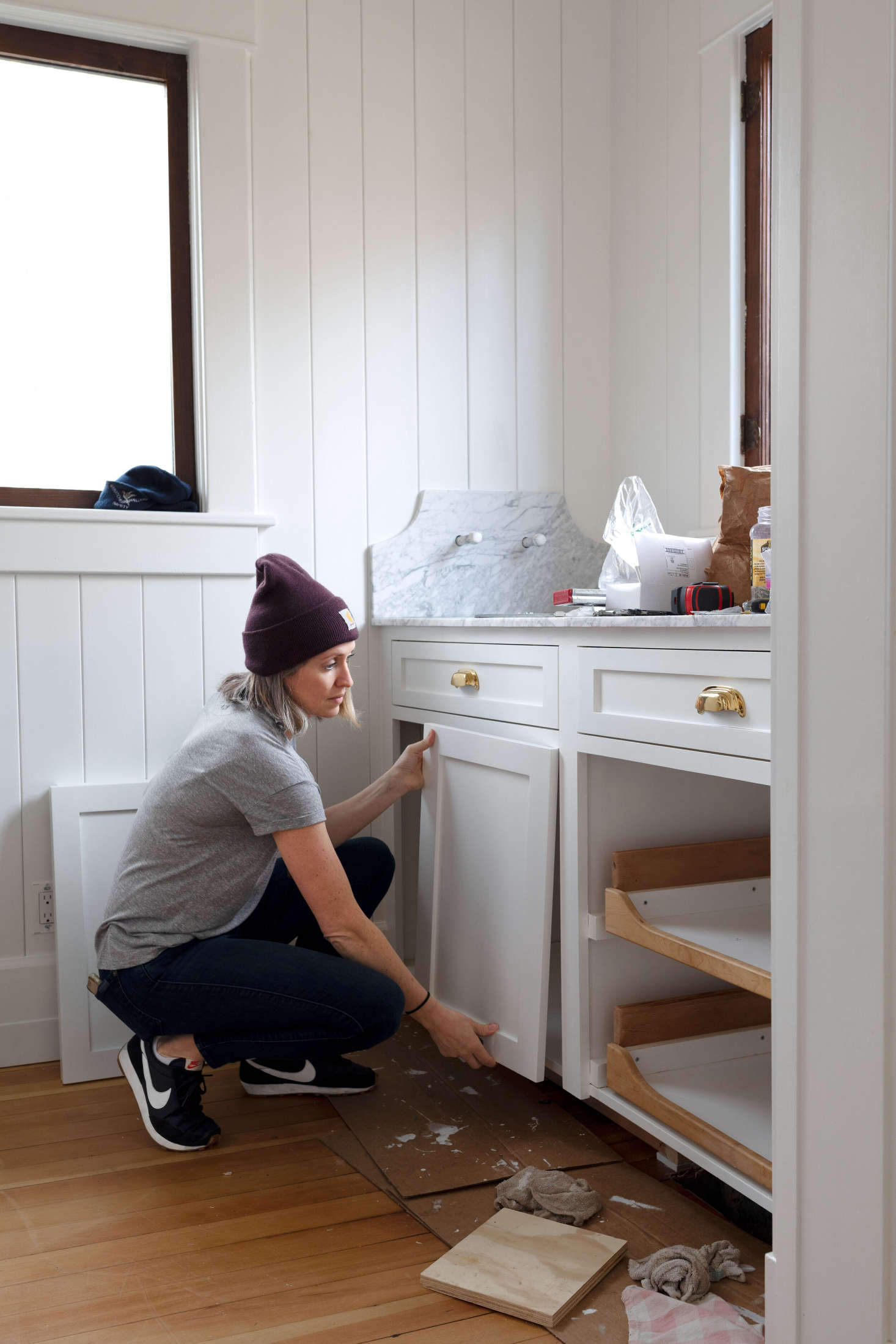 How to Paint Kitchen Cabinets By Hand: DIY Tips from Two Experts