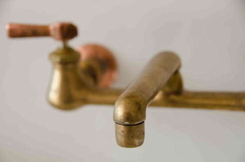 Remodelista Reconnaissance: The Secret Behind the Faucets in a Black ...