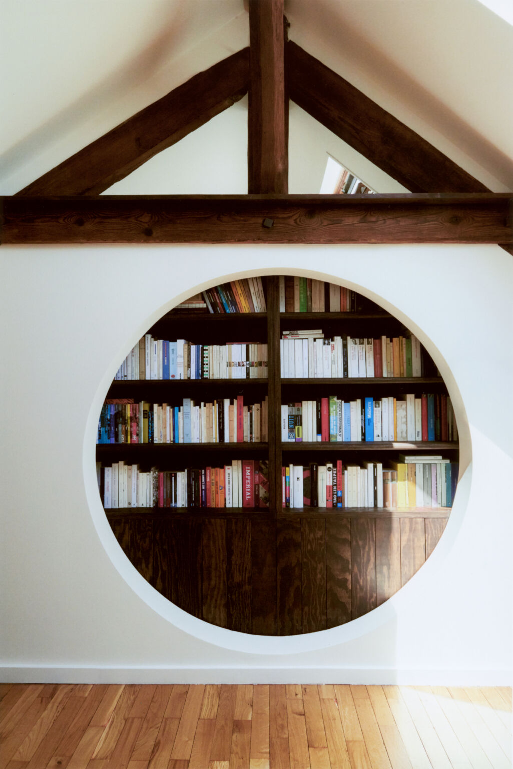 A Porthole Passage and a Moving Bookcase: An Apartment Remodel for a ...