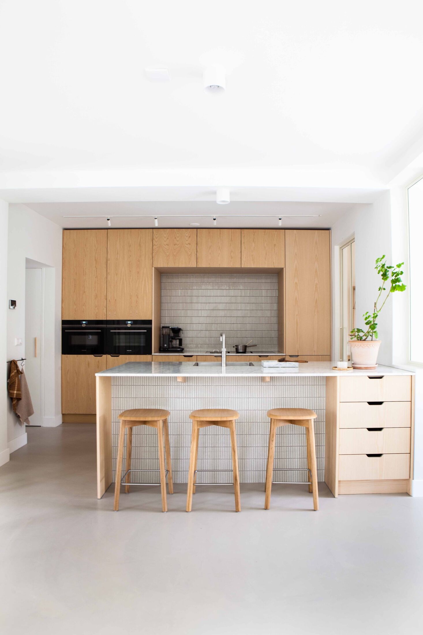 A Dream Trio—Clean-Lined Wooden Kitchen, Satellite Laundry, and Home ...